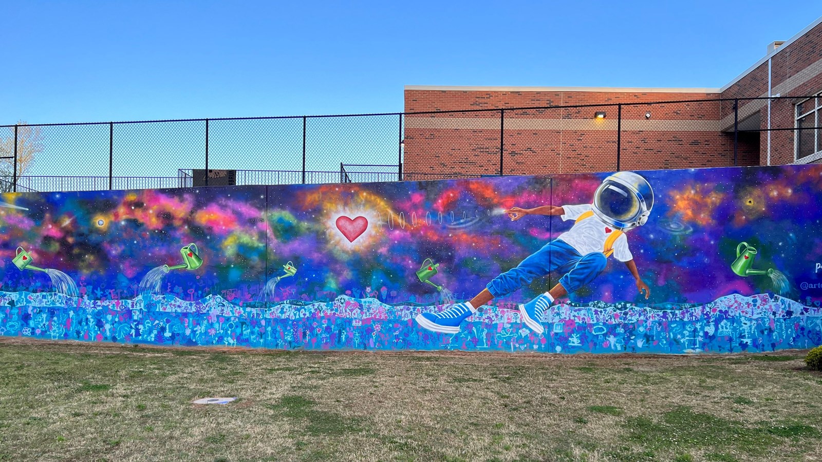 Brumby Debuts ‘The Aku Mural’ to Inspire Students